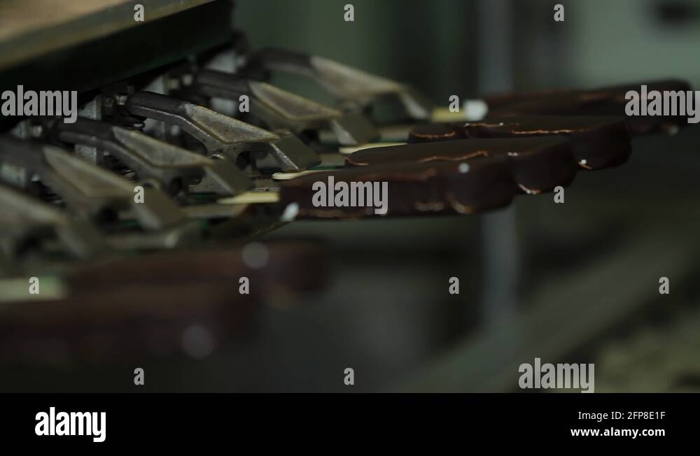 Ice cream production, chocolate coating process on ice cream ...