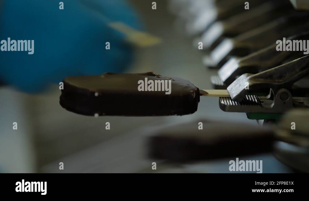 Ice cream production, chocolate coating process on ice cream ...