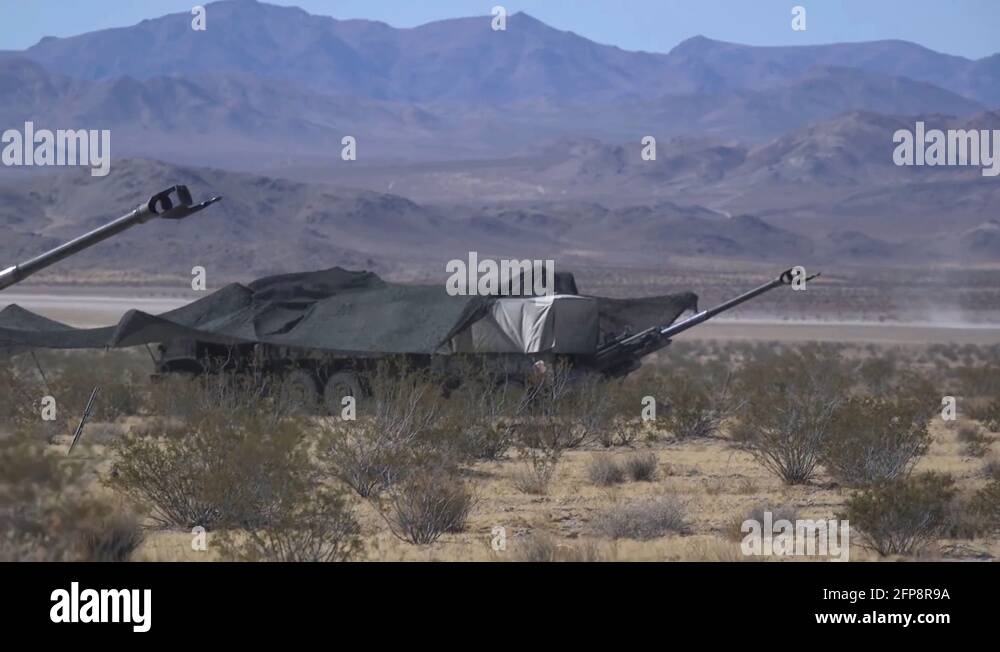 US Marine Corps artillery battalion. M777 howitzer Shot. Two howitzer ...