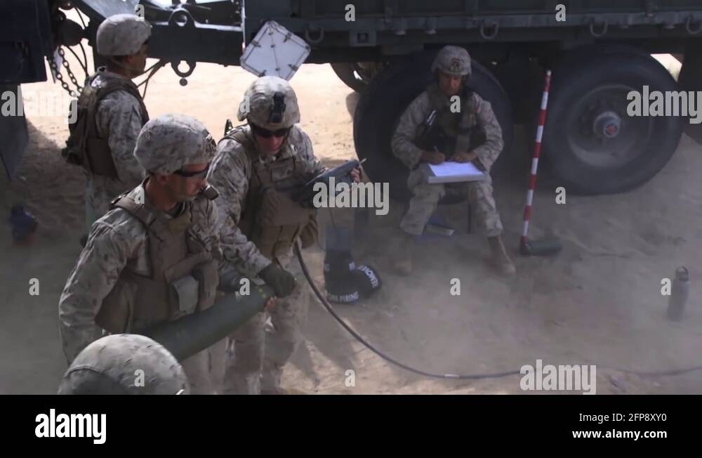 US Marine Corps artillery battalion. M777 howitzer Shot. Soldiers ...