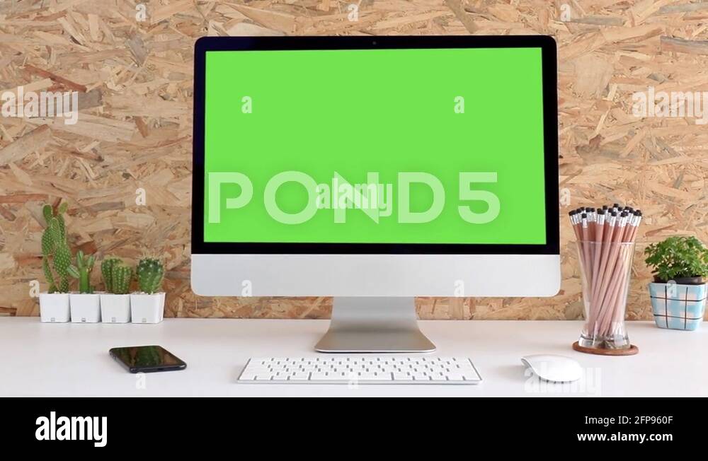 Computer desktop with mock-up green screen white background Stock Video ...