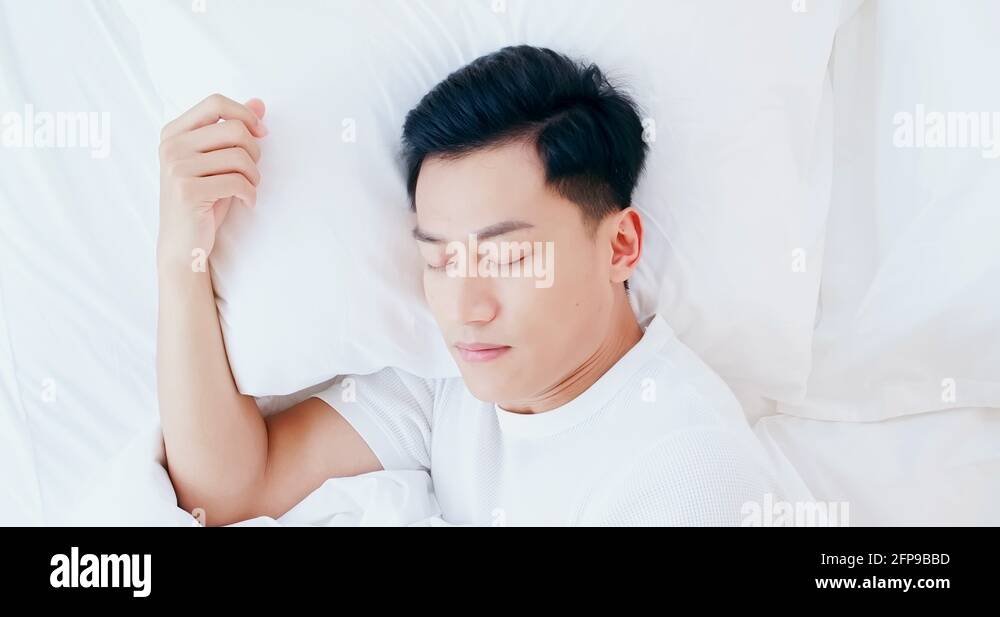 man sleeping well in bed Stock Video Footage - Alamy