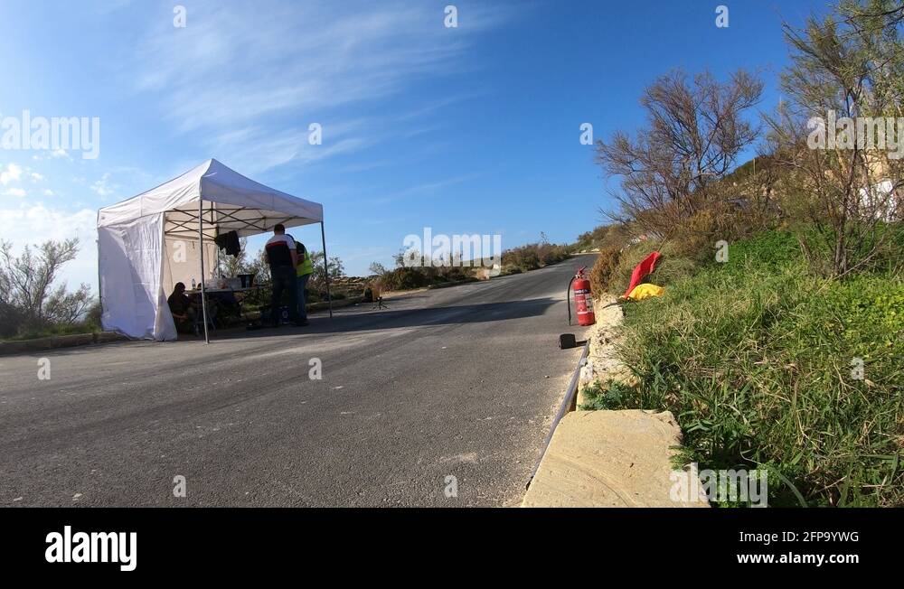 Pit Crews Talking Under The Tent At The Pit Stop With Fire Extinguisher ...