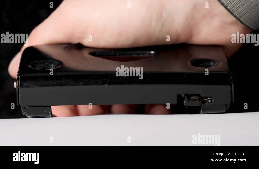 Punching paper Stock Videos & Footage - HD and 4K Video Clips - Alamy