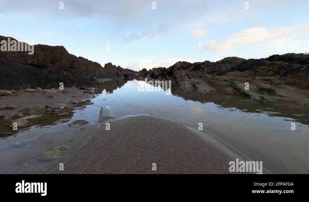 Puddle in the rocks Stock Videos & Footage - HD and 4K Video Clips - Alamy