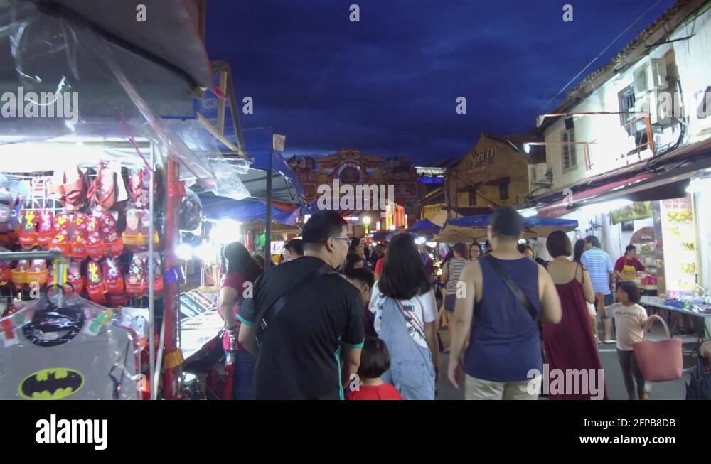 crowd of people walking in the night time Stock Video Footage - Alamy