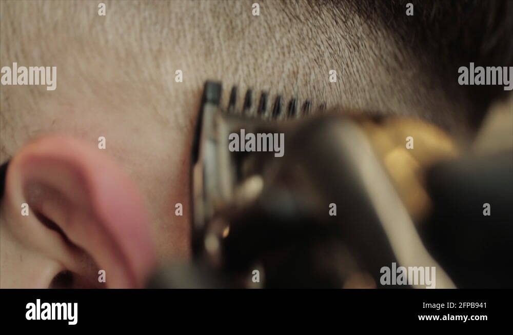 Men's haircut close-up shooting. Close-up video of haircut and hair ...