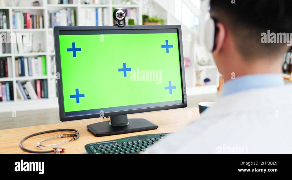 man watch green screen computer Stock Video Footage - Alamy