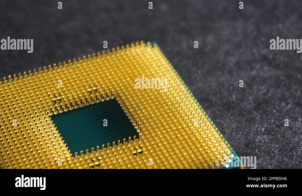 Central processing unit (CPU) outside computer, slow pan left, close up ...