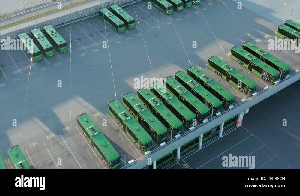 Drone Aerial of Bus Park. Green Electric Buses on Parking, Public Stock ...