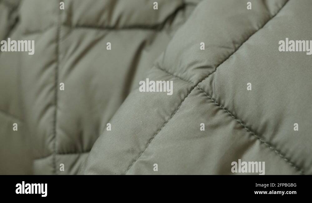 Puffer jacket seams and texture UHD panning footage Stock Video Footage ...
