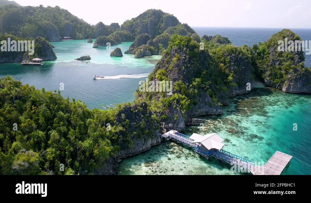 Piaynemo islands in Raja Ampat Indonesia with visitor pier right and ...