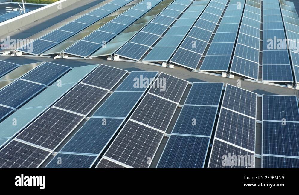 Birds Eye Aerial View of Modern Solar Panels Modules Array on Top of ...