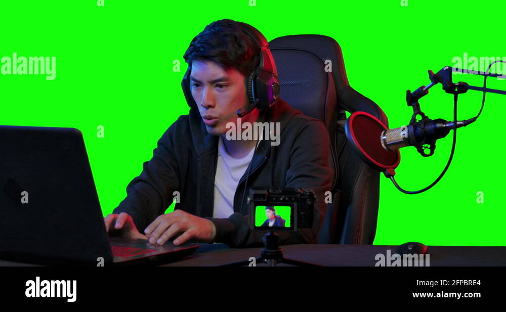 Pro Gamer Vlogger Live Stream Over Green Screen Background Stock Video Footage Alamy 