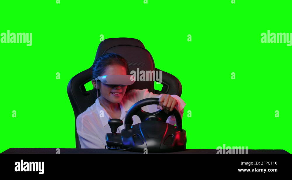 POV gamer playing in car racing game over green screen background Stock ...