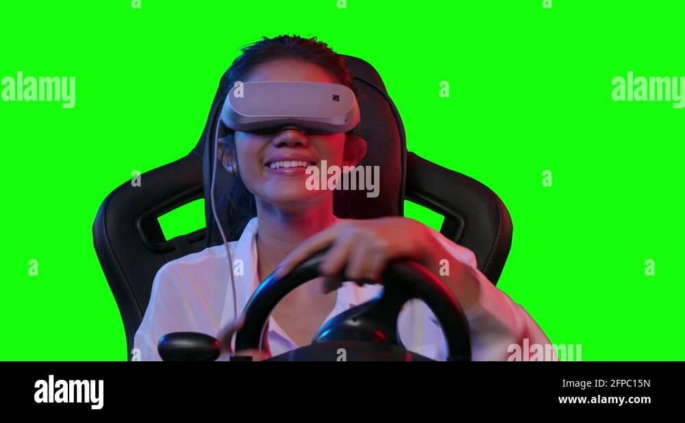 POV gamer playing in car racing game over green screen background Stock ...
