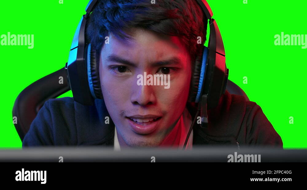 Pro gamer vlogger live stream over green screen background Stock Video ...