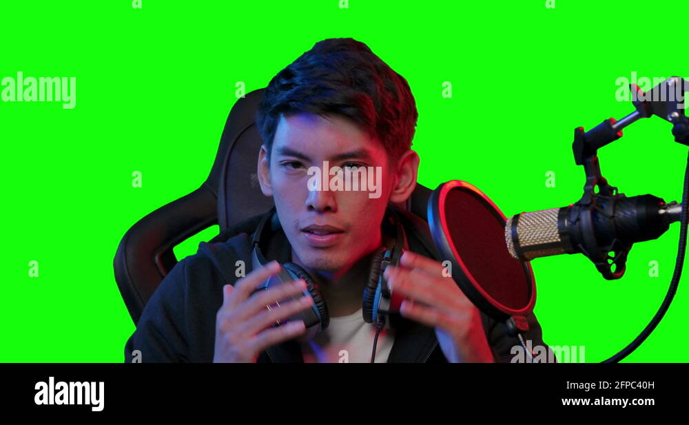 POV Pro gamer vlogger live stream over green screen background Stock ...