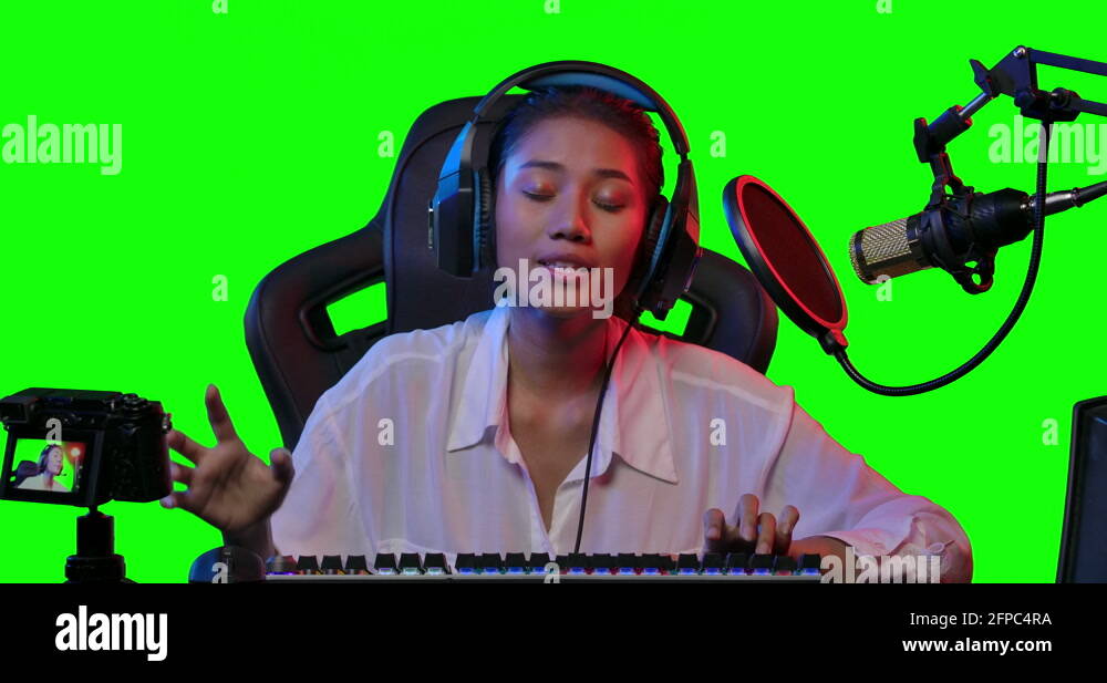 POV Pro gamer vlogger live stream over green screen background Stock ...