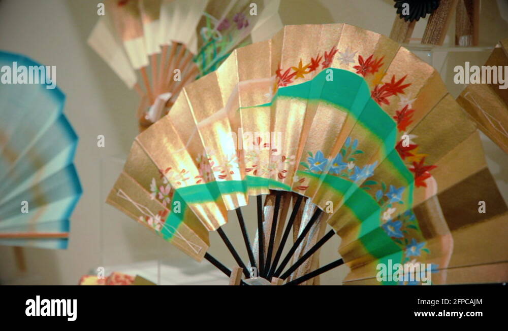 Gold chinese folding fan Stock Videos & Footage - HD and 4K Video Clips ...