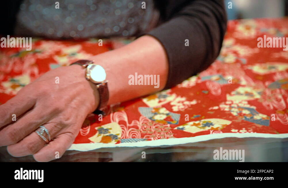 Red fabric hand Stock Videos & Footage - HD and 4K Video Clips - Alamy