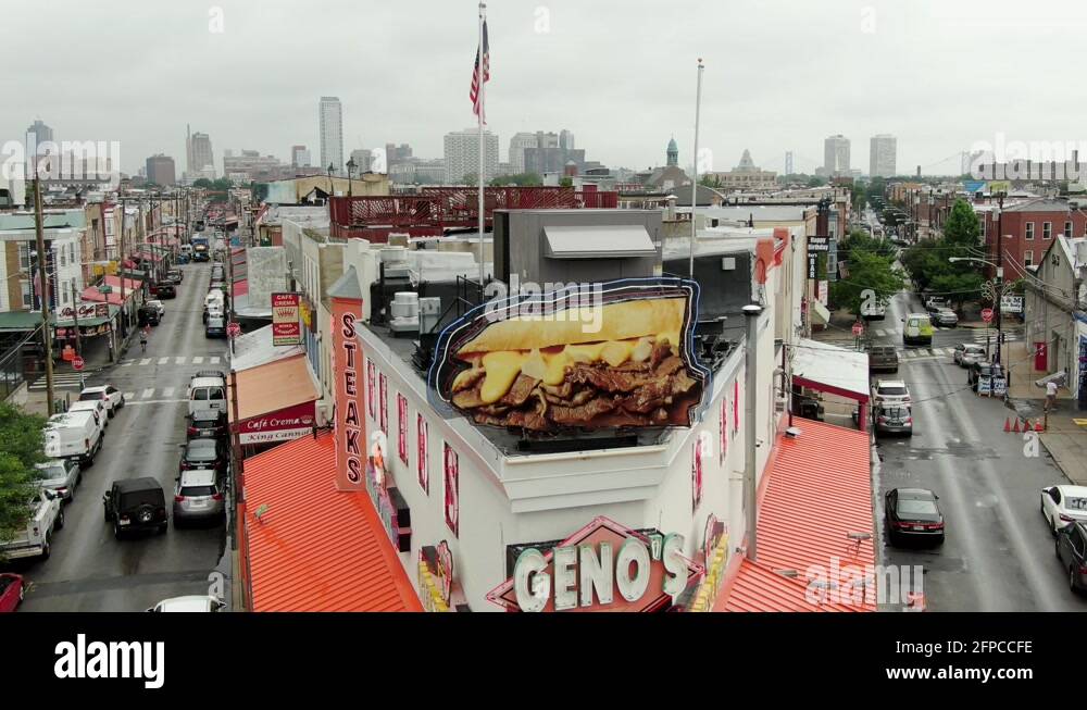 Geno's Steaks, famous Philly Cheesesteak with Philadelphia skyline in ...