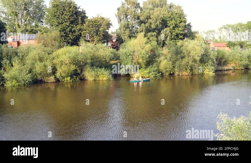 Kayak on River. Small Boat Rowing Along Water. Riverside View of 2 ...
