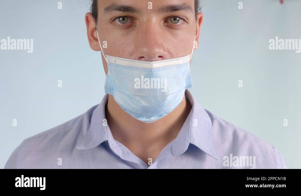 Wearing surgical nose mask Stock Videos & Footage - HD and 4K Video ...