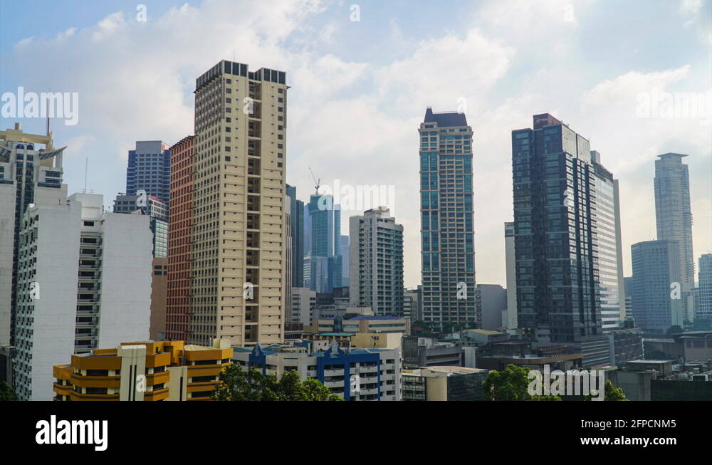 Clouds Soaring Above The High Rise Buildings In Makati, Philippines On ...
