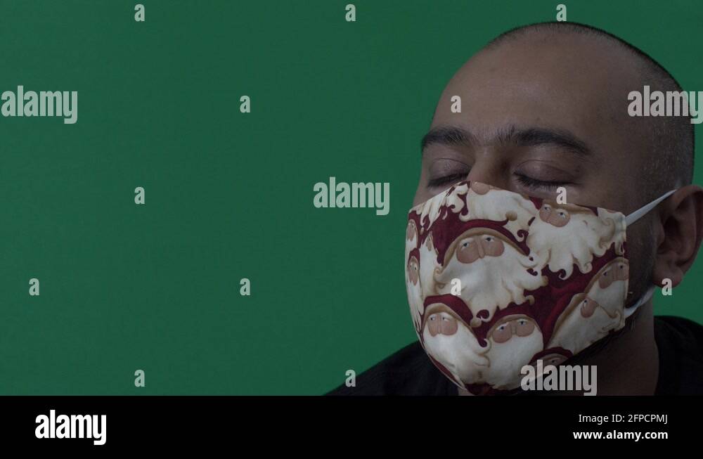 Bald Adult Male Wearing Santa Claus Face With Looking Away. Green ...