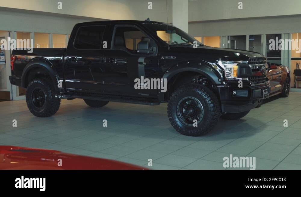Black Ford F150 FX4 Full Size Pickup Truck in Dealership Showroom Stock ...