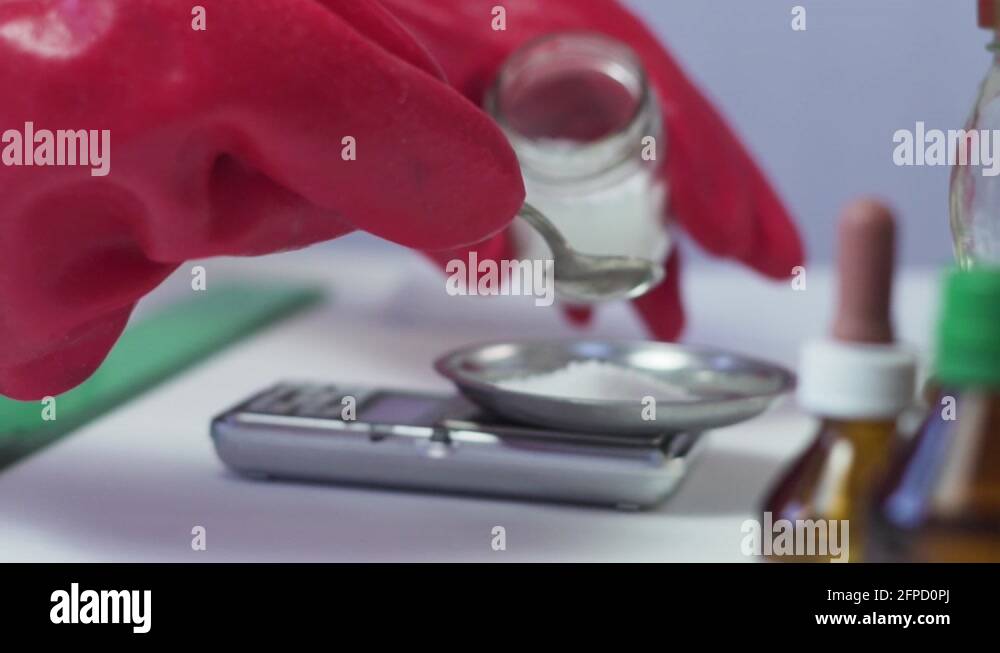 Measuring the right amount of medication before packaging - Slow motion ...