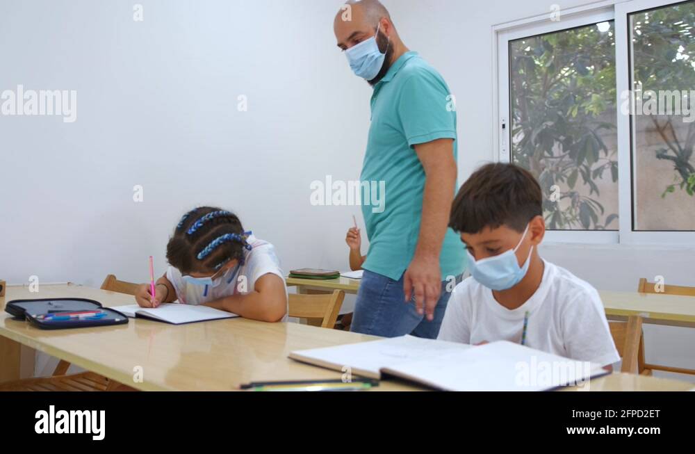 Students wearing masks classroom Stock Videos & Footage - HD and 4K ...