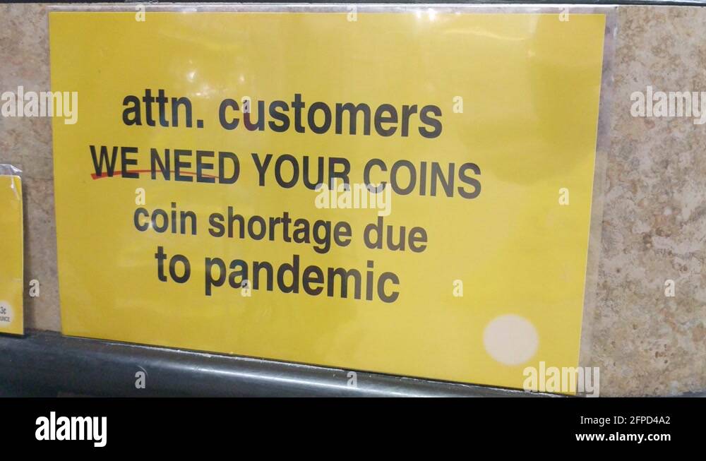 Coin shortage sign in department store during the COVID-19 pandemic ...