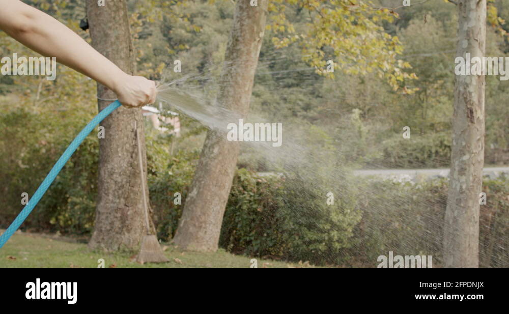 Man holding hose pipe Stock Videos & Footage - HD and 4K Video Clips ...