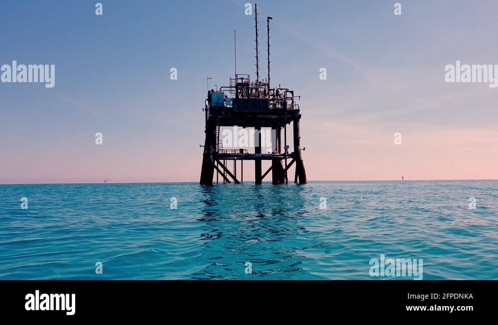 Sea level perspective of offshore oil platform or gas rig approach in ...