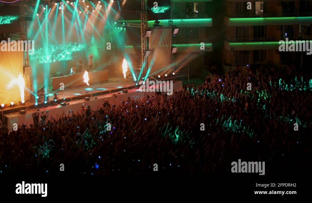 Crazy crowd clapping hands - Massive crowd party at festival next to ...