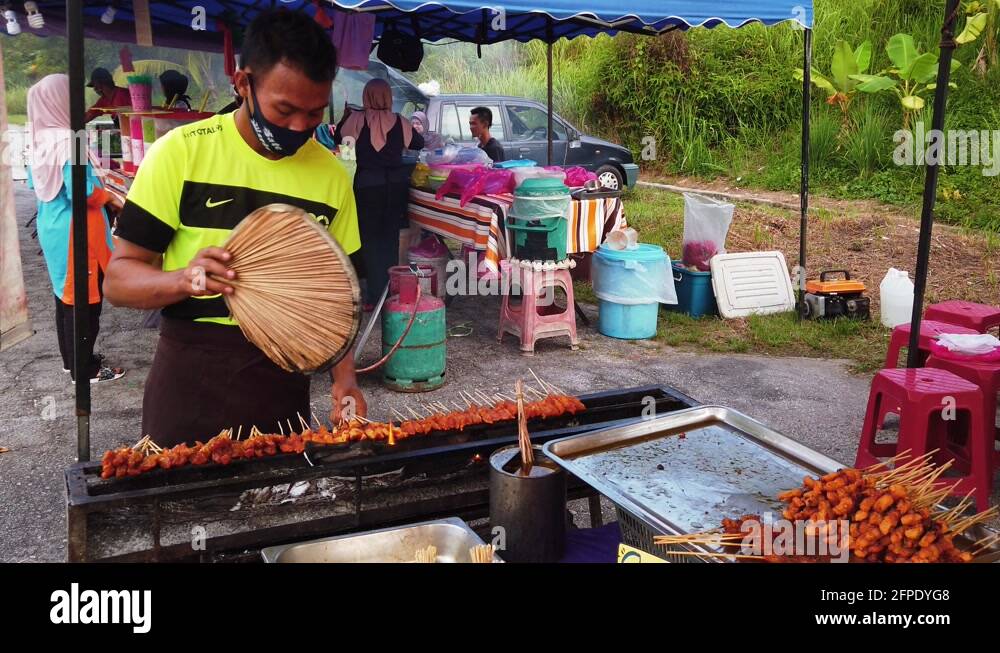 Man cooking satay Stock Videos & Footage - HD and 4K Video Clips - Alamy