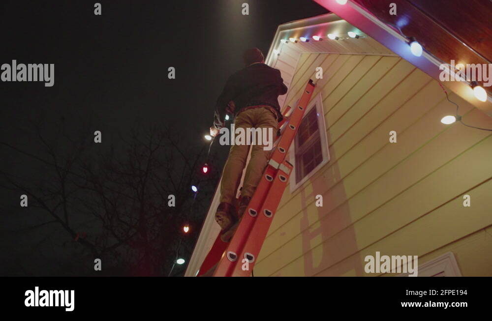 Hanging on a ladder Stock Videos & Footage - HD and 4K Video Clips - Alamy