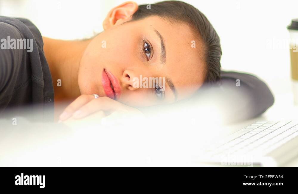 Head resting on desk Stock Videos & Footage - HD and 4K Video Clips - Alamy