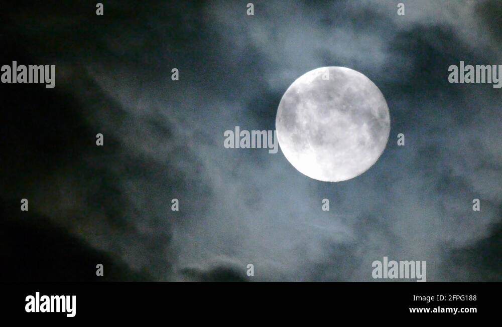 real Full Moon night clouds creepy no CG 24P Stock Video Footage - Alamy