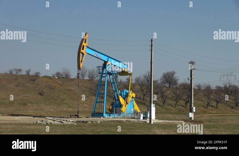 Working oil pumpjack, donkey pumper, oil well pump, fuel drilling ...