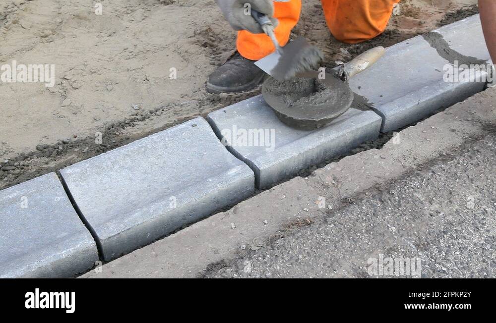 Installing curb stone Stock Videos & Footage - HD and 4K Video Clips ...