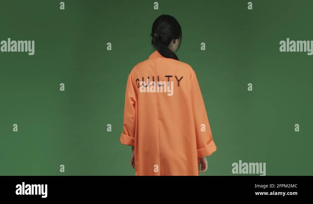 young asian adult woman prisoner isolated on green-screen background ...