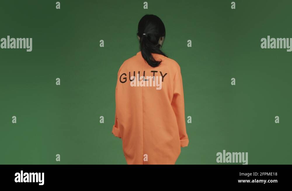 young asian adult woman prisoner isolated on green-screen background ...