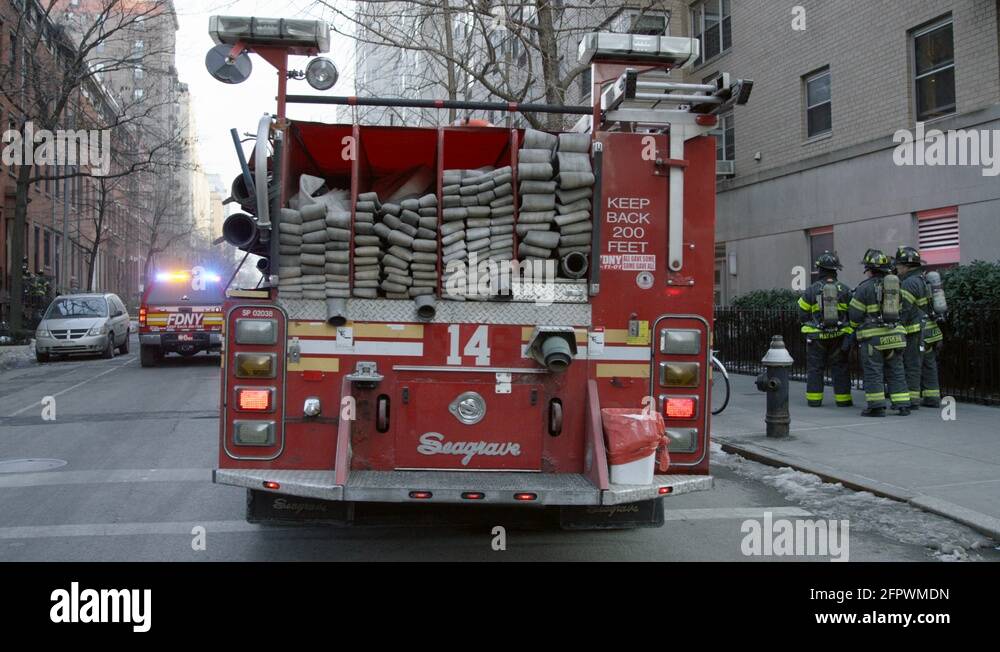 firetruck firefighters tracking slow motion 4K emergency vehicle smoke ...