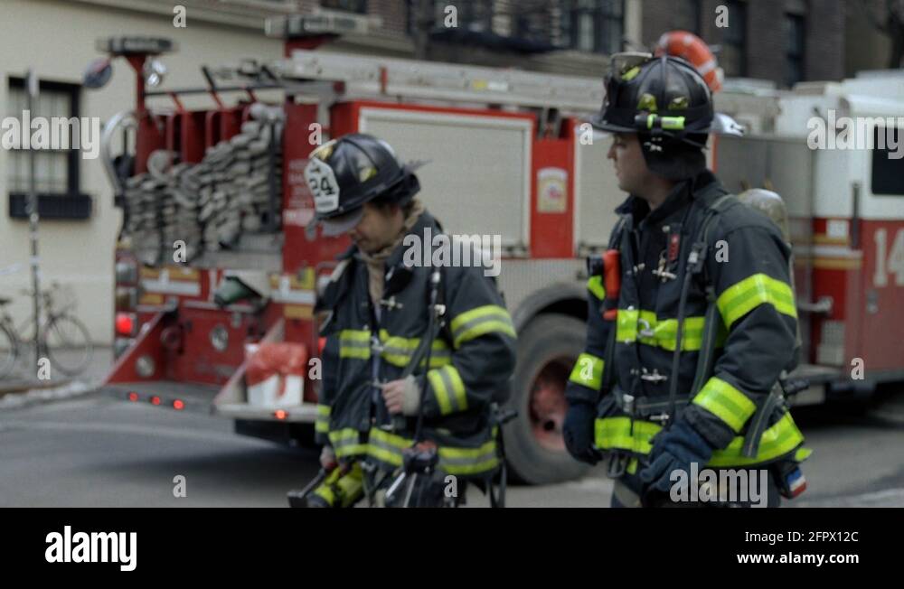 2 FDNY firefighters cross street firetruck NYPD police slow motion 4K ...
