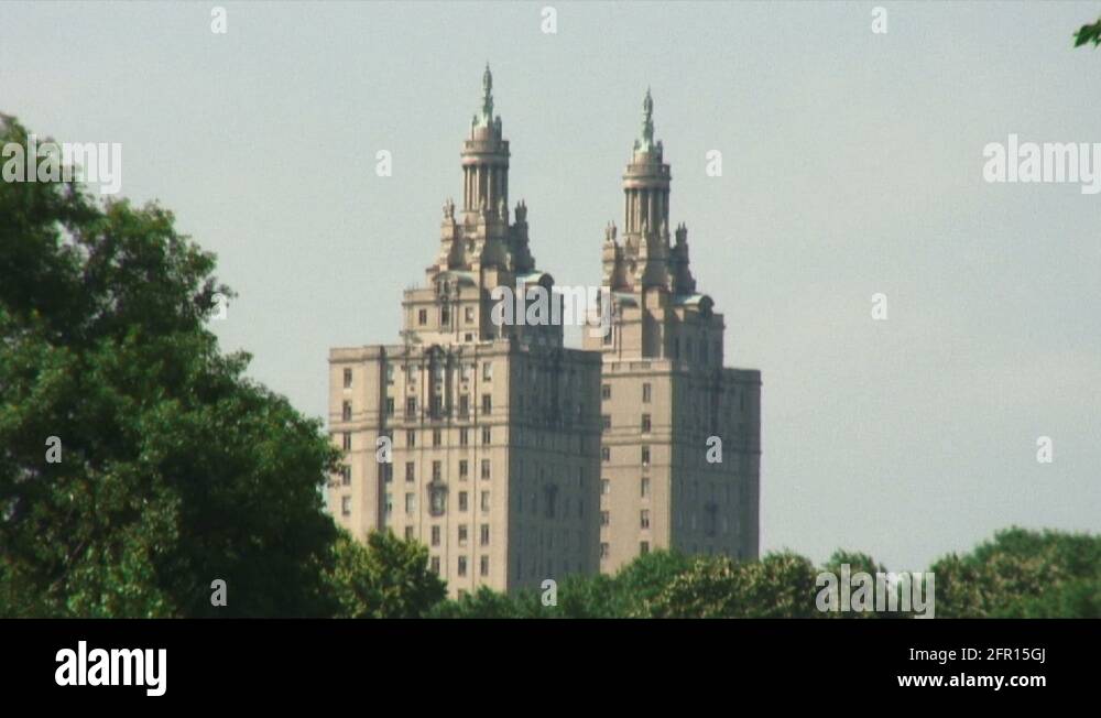 Two identical buildings seen above trees in New York City Stock Video ...