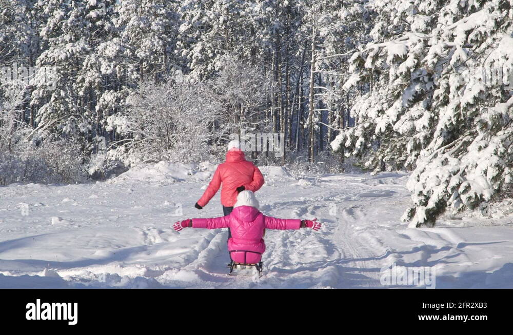 Parent pulling girl sled Stock Videos & Footage - HD and 4K Video Clips ...