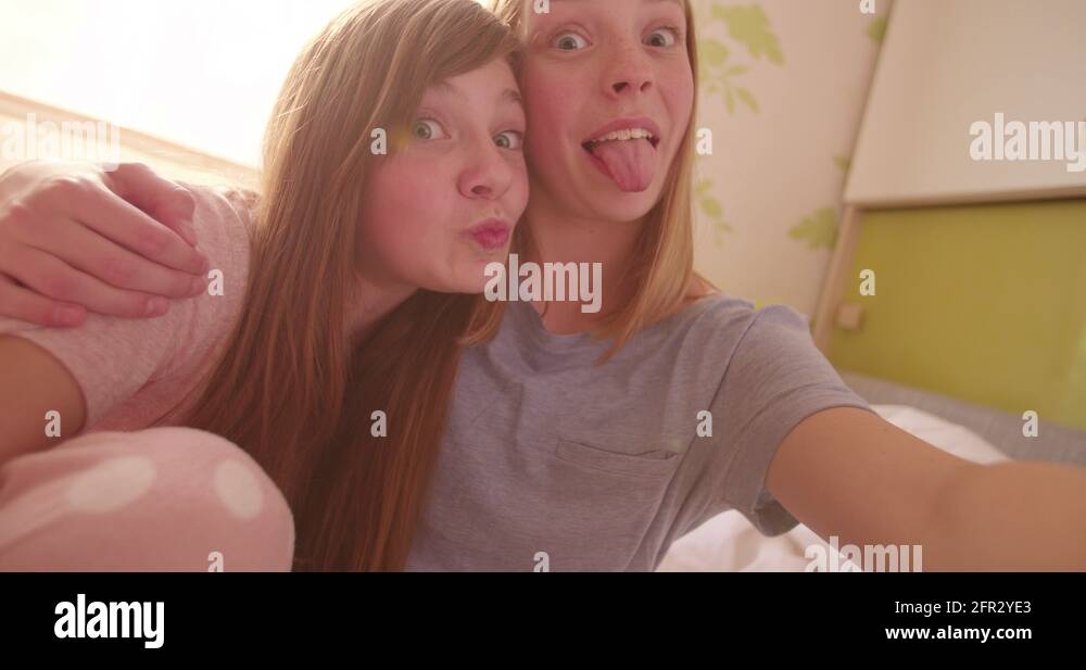 Two girls sticking out tongues Stock Videos & Footage - HD and 4K Video ...